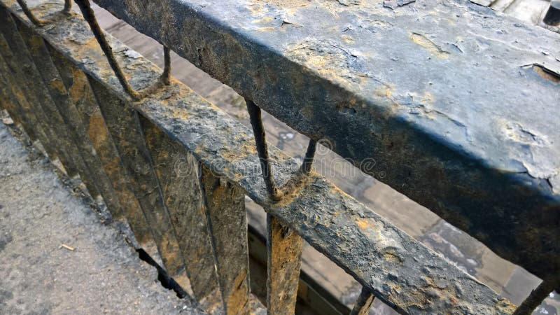 Yellow Rust on Metal Railing. Black Paint Stock Image - Image of ...