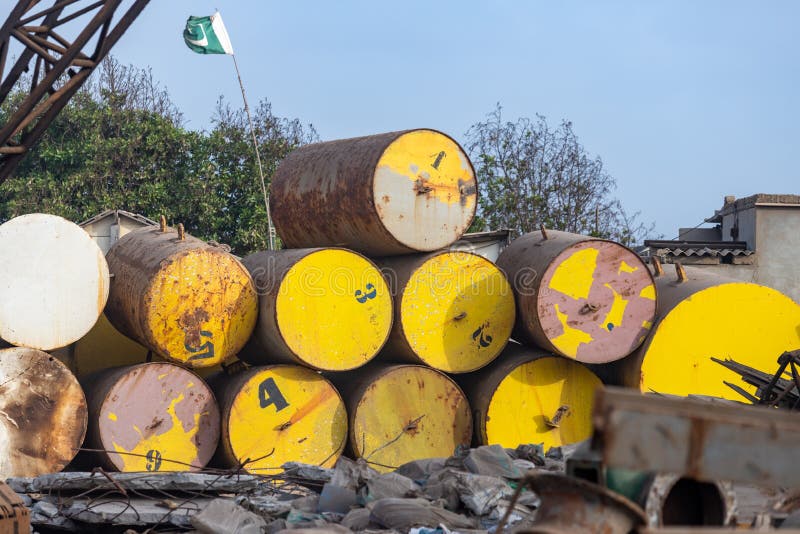 Yellow rusted barrels stock image. Image of maintenance - 268771845