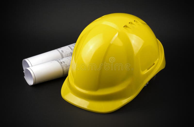 Yellow Safety Hard Hat with Engineering Drawings Stock Photo - Image of ...