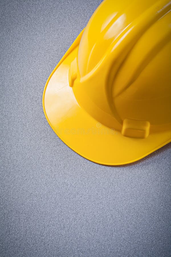 Yellow Safety Hard Hat on Grey Background Construction Concept Stock ...