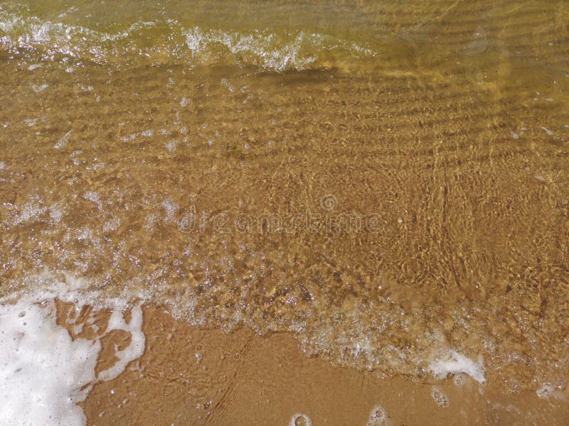 Yellow Sand Beach and Transparent Wave Closeup Stock Photo - Image of ...