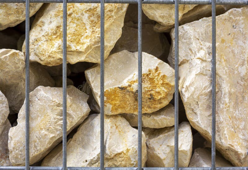Yellow Sand-lime Bricks in a Steel Gabion Stock Image - Image of cage ...