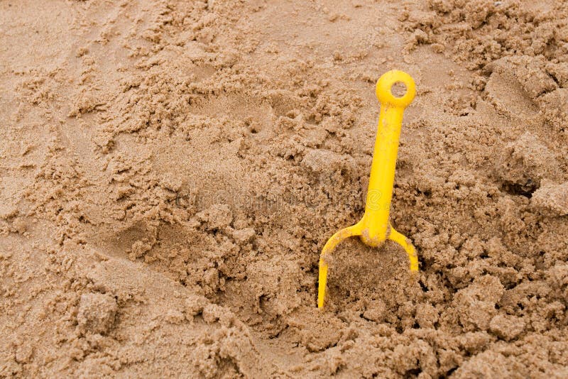 Yellow sand spade stock image. Image of object, spade - 5474543