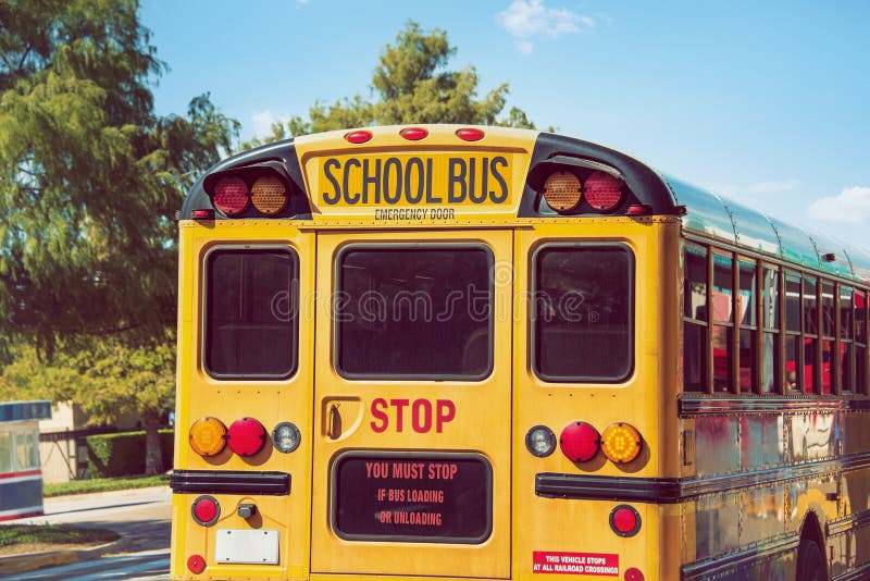Yellow School Bus, Rear View Editorial Stock Photo - Image of classic ...