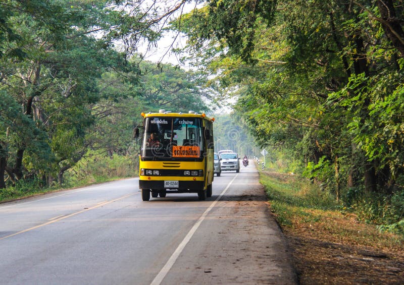 Yellow School Bus on the Road in Thailand Editorial Photo - Image of ...