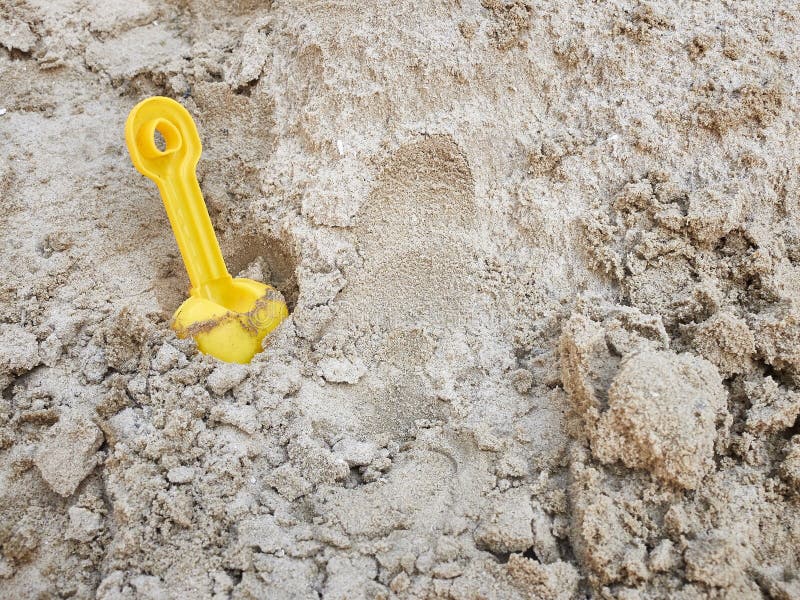 Yellow Scoop in the Sandbox. Photo of Children Sandbox with Copy Space ...