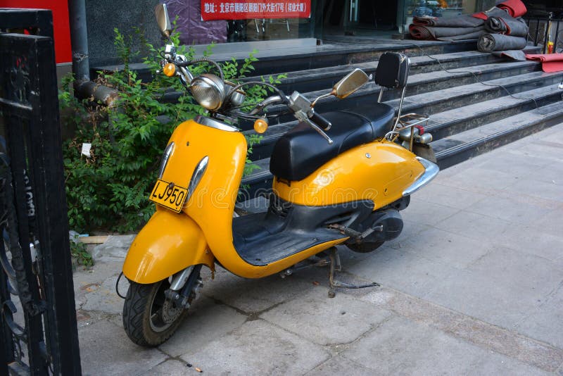 Yellow scooter editorial stock image. Image of bright - 80107224