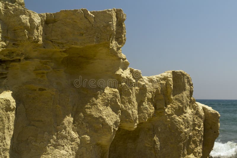 Yellow Sea Cliff in Front of Blue Sky Stock Image - Image of tourism ...