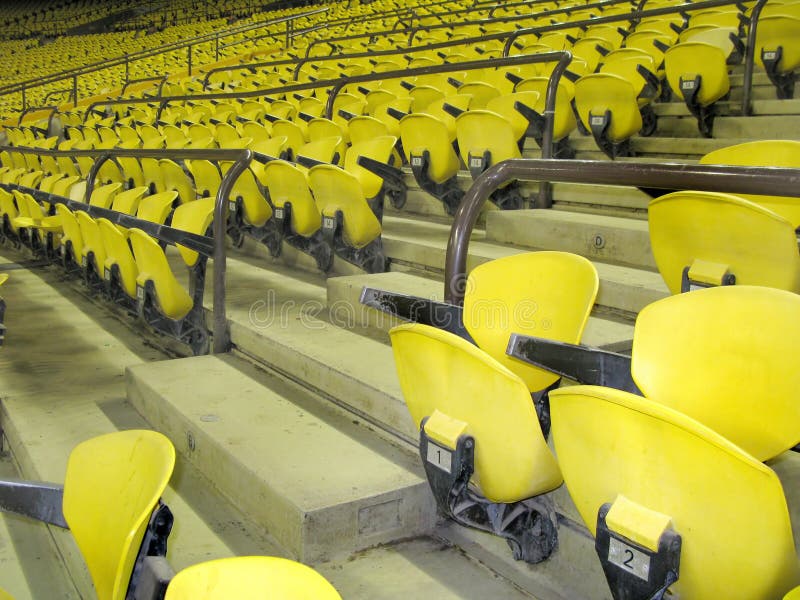 Yellow seats stock photo. Image of deck, olympic, aisle - 13133982