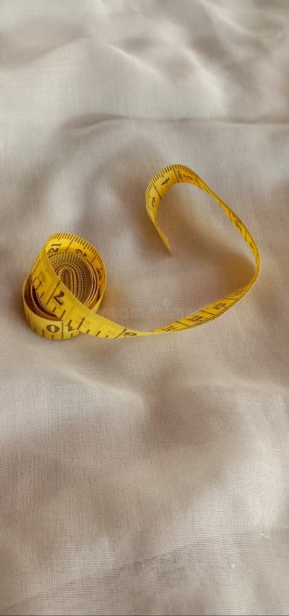 Yellow Sewing Measuring Tool for Measuring Clothes and Fabrics Stock ...