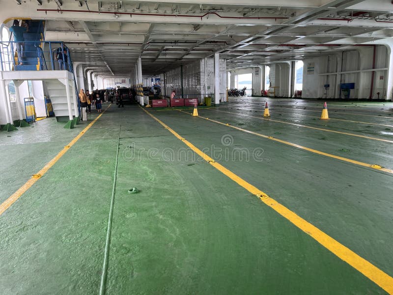 Yellow Ship Bridge with Black Yellow Lines and Car Parking Space Inside ...
