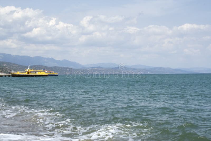 Yellow ship on ocean stock image. Image of vacation, sunny - 5916957