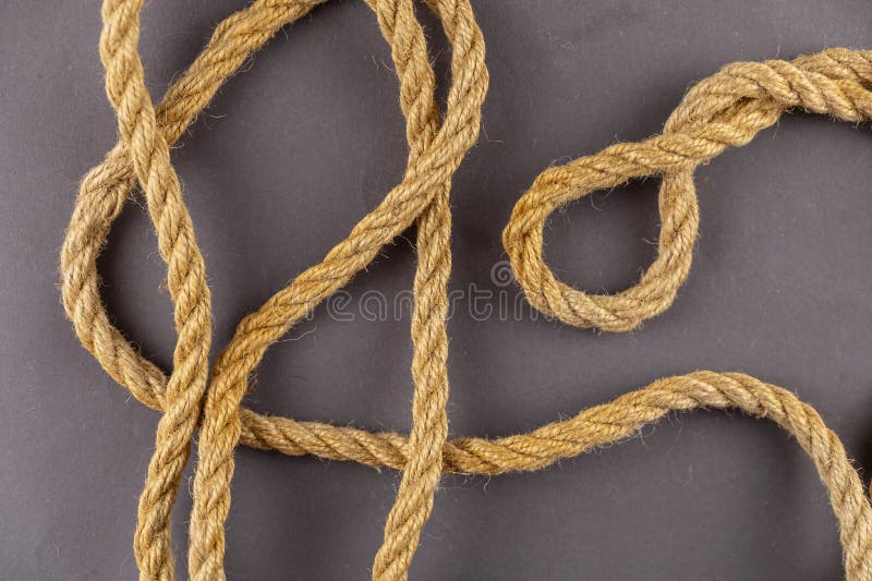 The Yellow Ship Rope Against the Gray Background. the Twisted Rope is ...