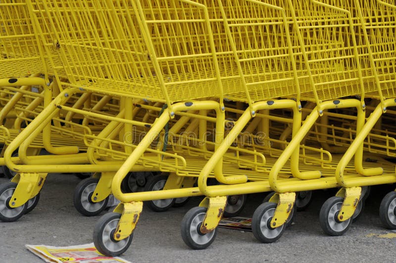 Yellow Shopping Carts stock image. Image of retail, metal - 10485445