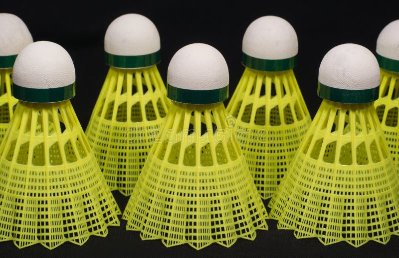 Yellow Shuttlecocks Isolated on Black Stock Image - Image of synthetic ...