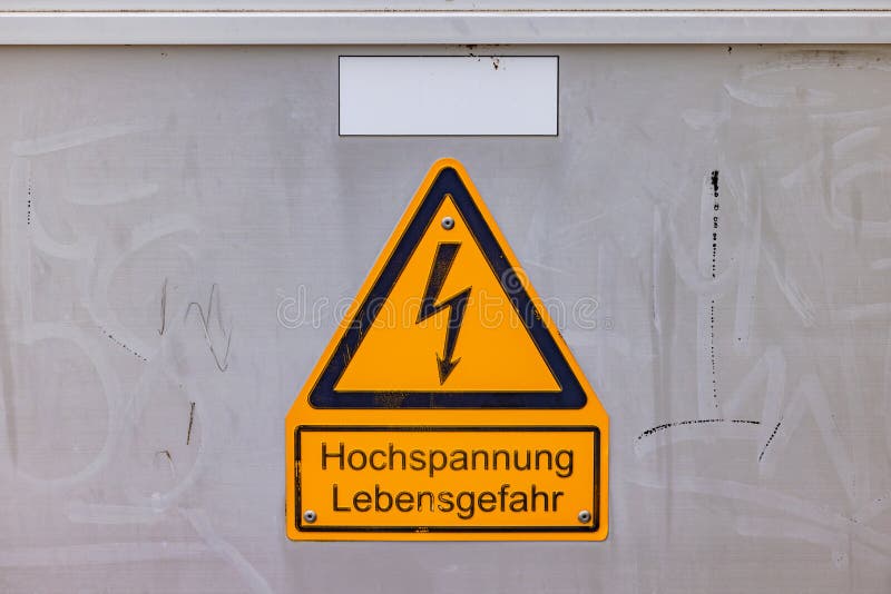 Warning High Voltage Sign, Danger To Life in German Stock Photo - Image ...