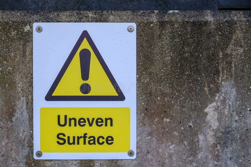 Yellow Sign Warning of Uneven Surface Stock Image - Image of dangerous ...