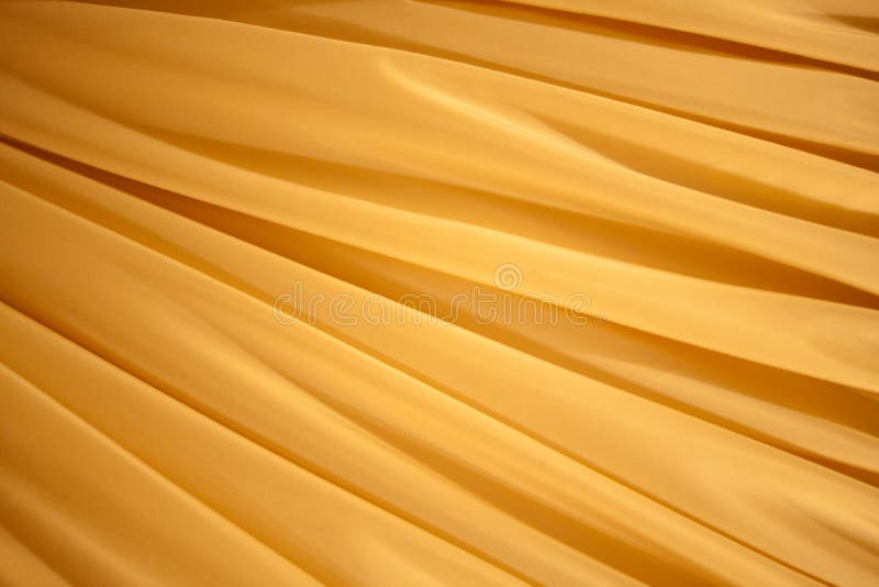 Yellow silk stock image. Image of rippled, yellow, shape - 16626467