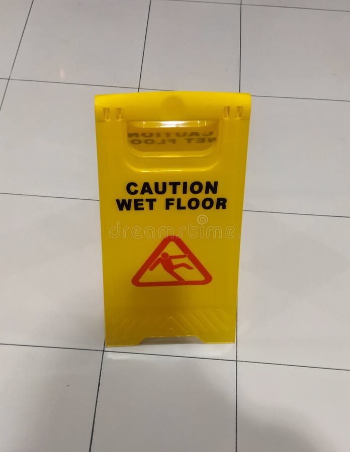 Yellow Sing with Warning Caution Wet Floor Stock Photo - Image of sing ...