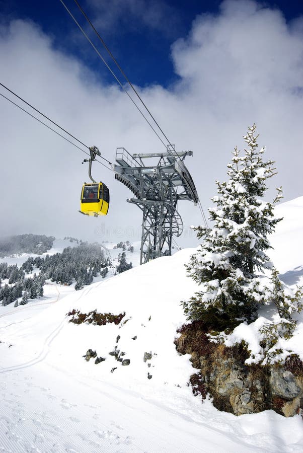 Yellow ski lift in Alps stock image. Image of panorama - 6272115