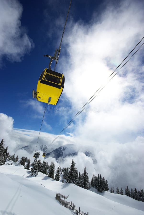 Yellow ski lift in Alps stock photo. Image of season, skies - 6272394