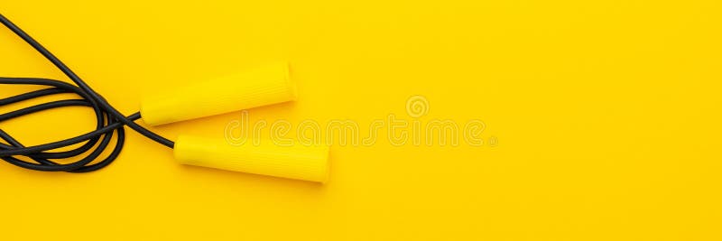Yellow skipping rope stock photo. Image of health, jumprope - 196151230