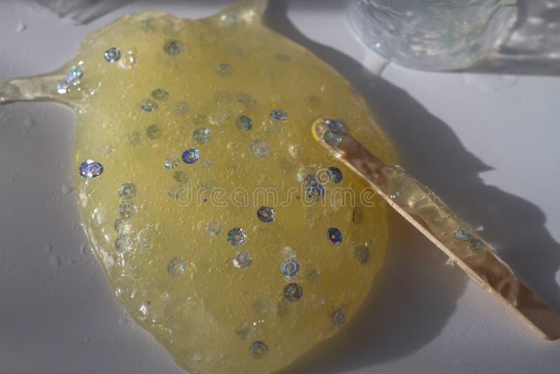 Yellow Slime with Silver Sequins Made by Children Themselves from ...
