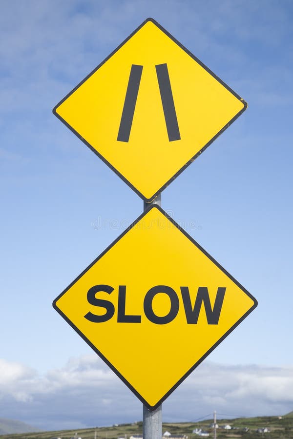 Yellow Slow Sign stock photo. Image of yellow, security - 63117088