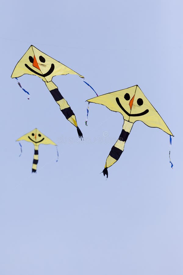 Yellow smile kites stock image. Image of vertical, freedom - 24790601