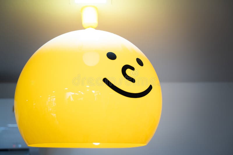 Yellow Smiley Face Lamp on the Cafe Ceiling Stock Photo - Image of mood ...