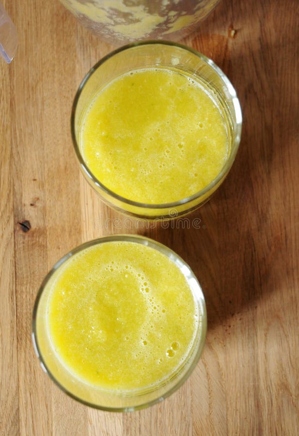 Yellow Smoothies in Two Glasses Top View Stock Photo - Image of ...