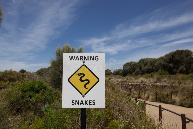 Yellow Snakes Warning Sign in the Beach in Australia Stock Image ...