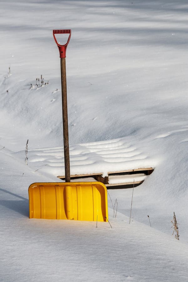 Yellow snow shovel snow stock photo. Image of nature - 111027964