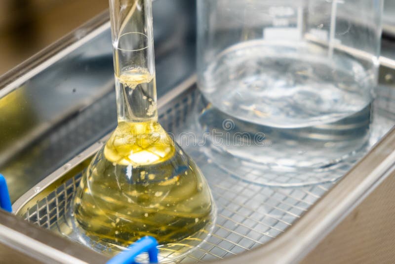 Yellow Solution in the Flask and Beaker for Dissolving or Extraction ...