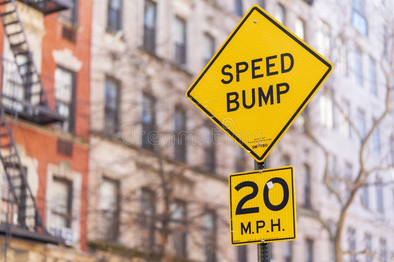 Yellow Speed Bump Sign in the City Stock Photo - Image of structure ...