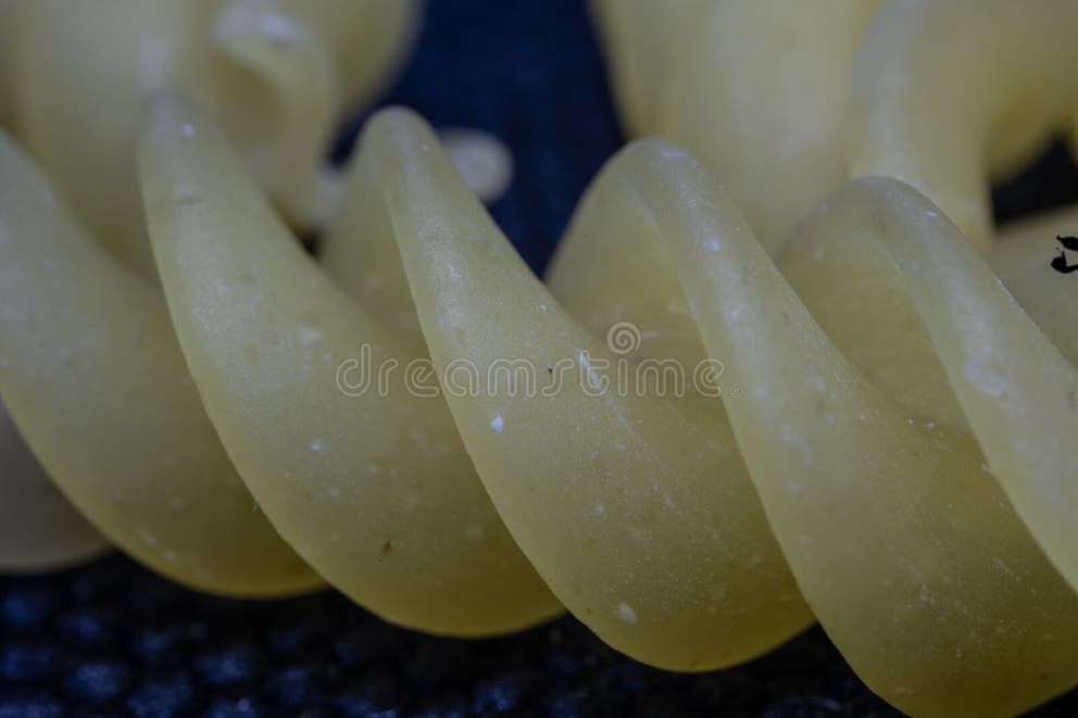 Yellow Spiral Pasta Magnifyed Stock Image - Image of spiral, nutritious ...