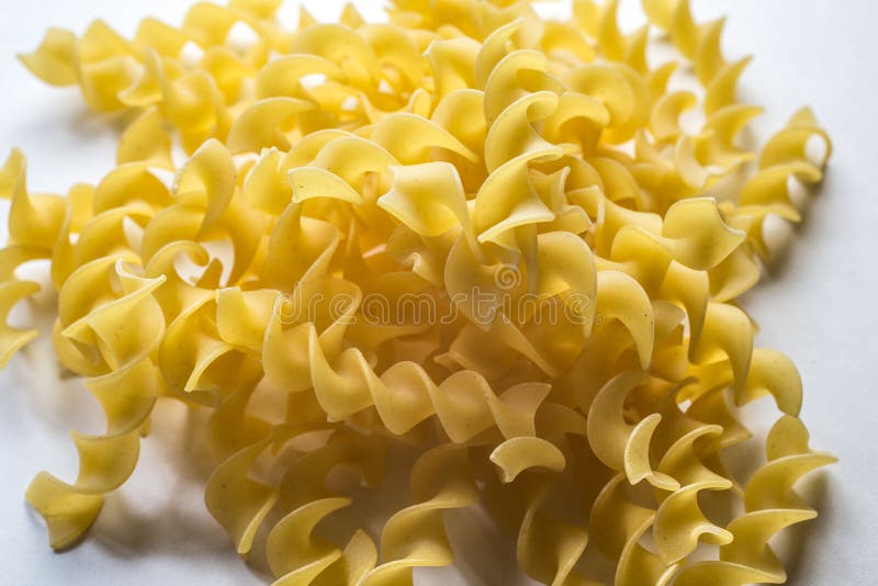 Yellow Spiral Pasta in a Pile Stock Image - Image of delicious ...
