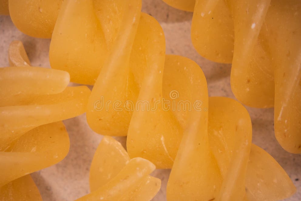 Yellow Spiral Pasta in a Pile Stock Photo - Image of nutritious, lunch ...