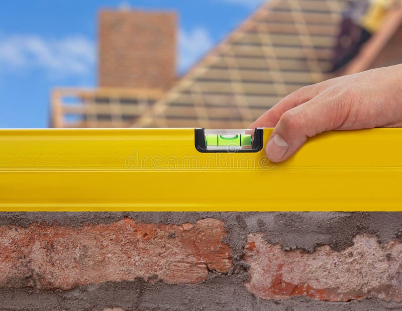 Yellow Spirit Building Level in Construction Site. Stock Photo - Image ...