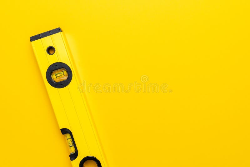 Yellow Spirit Level on Yellow Background with Some Copy Space Stock ...