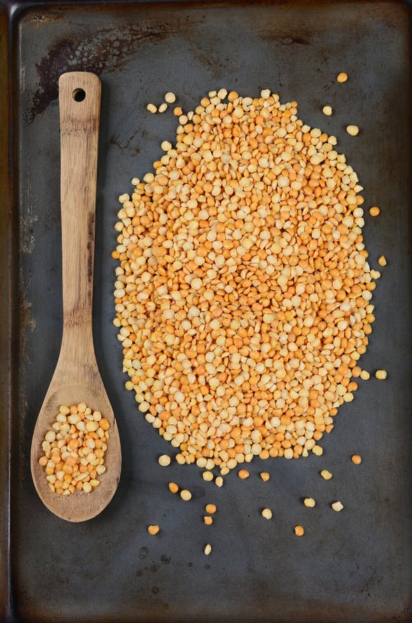 Yellow Split Peas and Spoon Stock Image - Image of food, life: 48557749