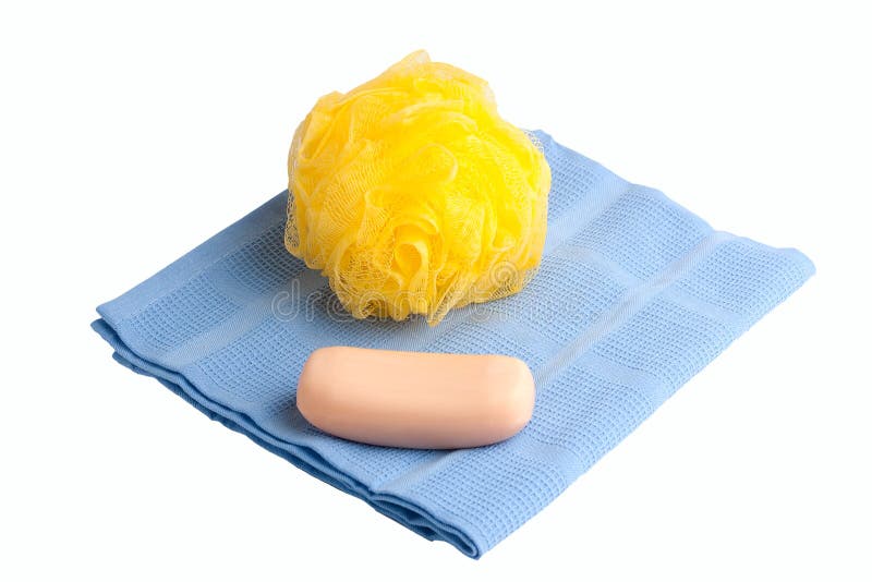 Yellow Sponge and Soap on a Blue Background. Stock Photo - Image of ...