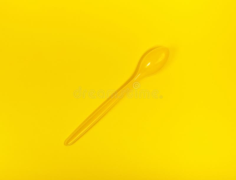 Yellow Spoon with Brown Egg Stock Image - Image of conceptual, small ...