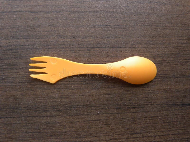 Yellow spork spoon stock photo. Image of cutout, cutlery - 127395068