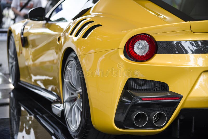 Yellow sports car stock photo. Image of metal, taillight - 76918478