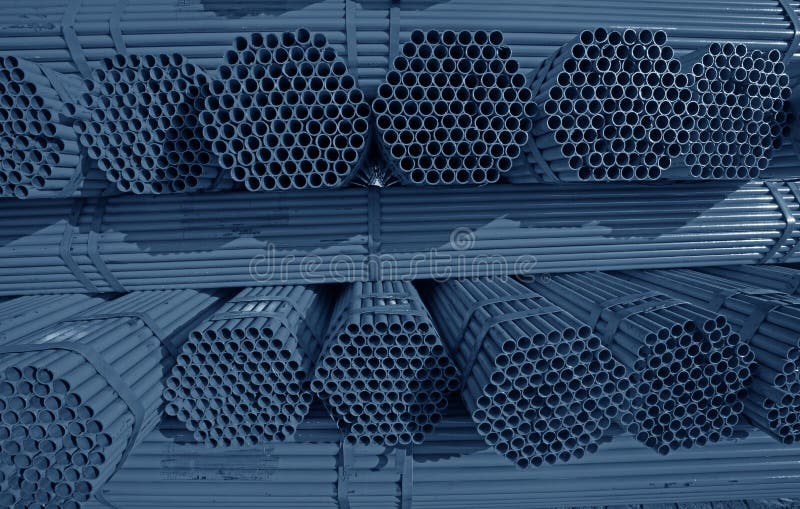 Yellow stacked steel pipe stock image. Image of stainless - 225825409