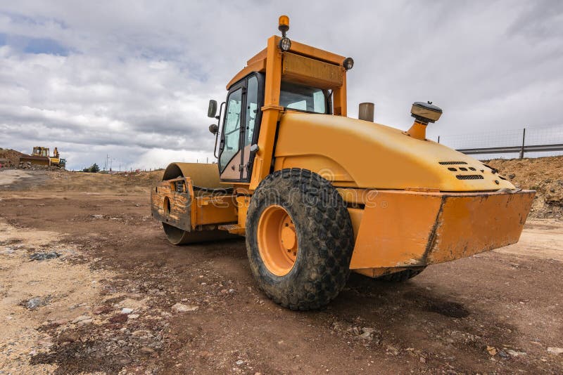Steamroller Performing Earth Compaction Work for Later Asphalting Stock ...