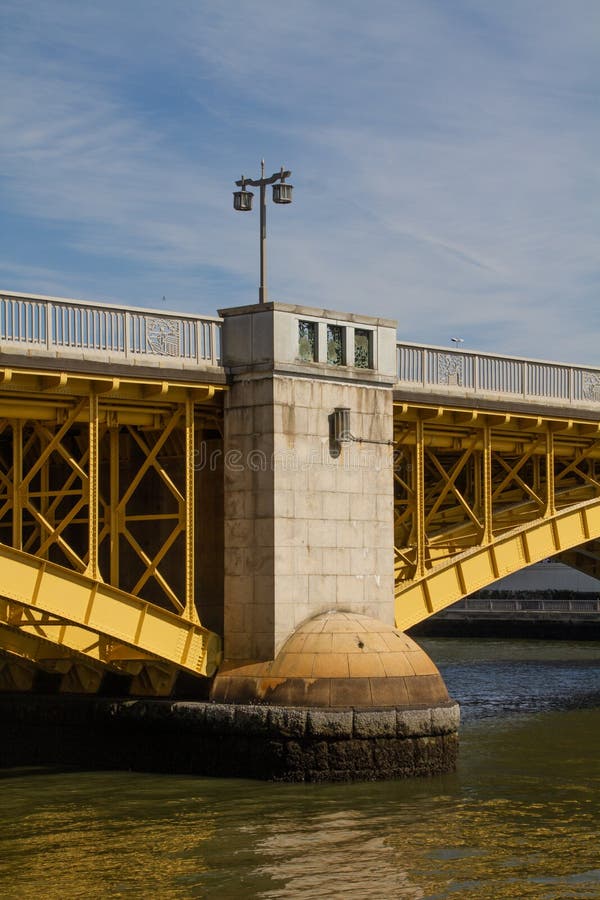 A yellow steel bridge stock photo. Image of strong, beams - 159205002