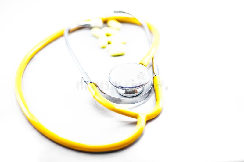 Yellow Stethoscope with Pills Stock Image - Image of illness ...