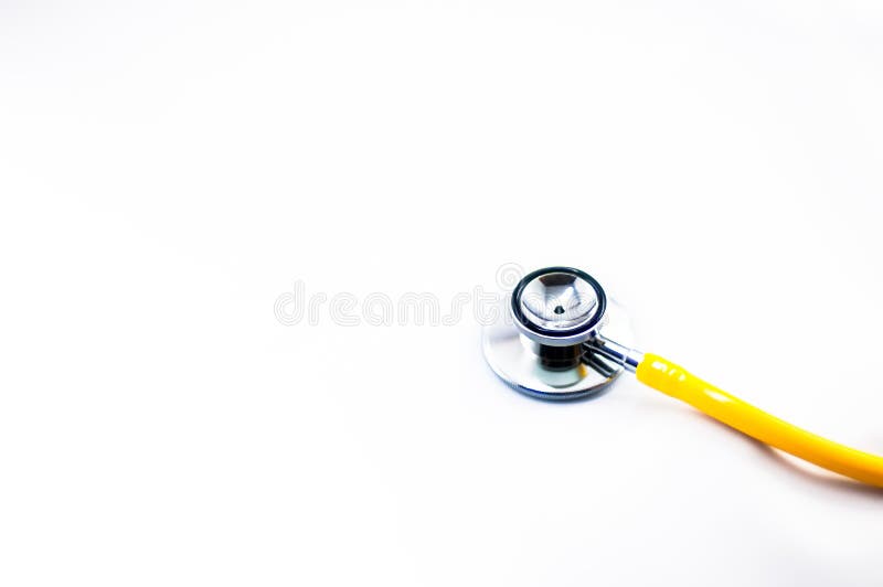 Yellow Stethoscope on a Book Stock Photo - Image of doctor, examination ...